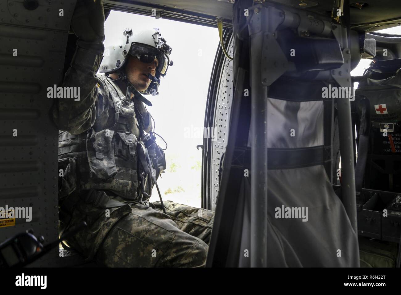 Spc. Brett A. Kincaid, a crew chief with 1st Battalion, 106th Aviation ...