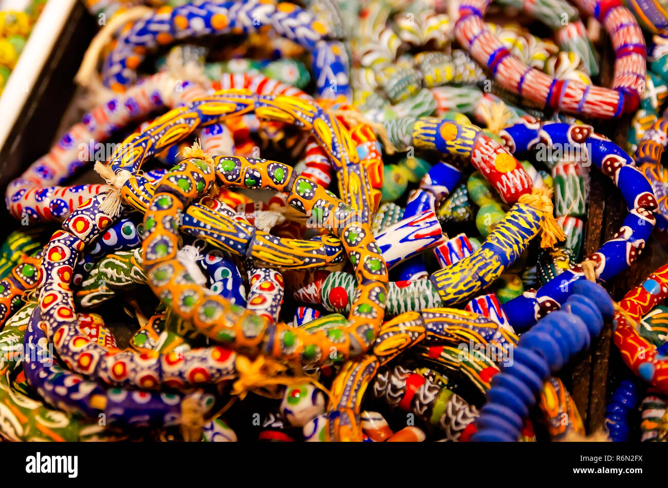 African krobo bead bracelets are stacked in bins at the 34th annual ...