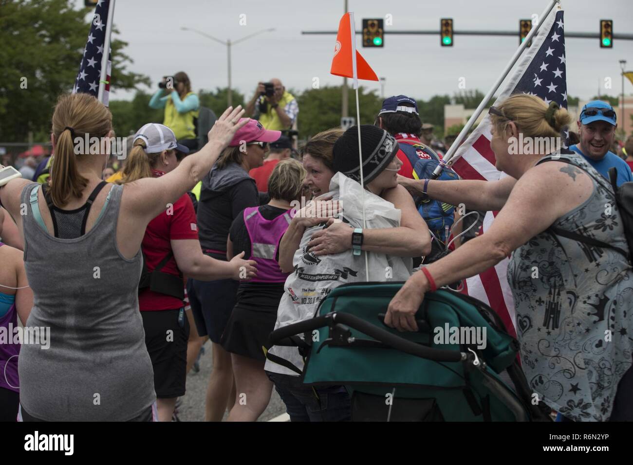 Laura Haberkorn hugs Sarah Simonson after finishing the 10th Annual ...