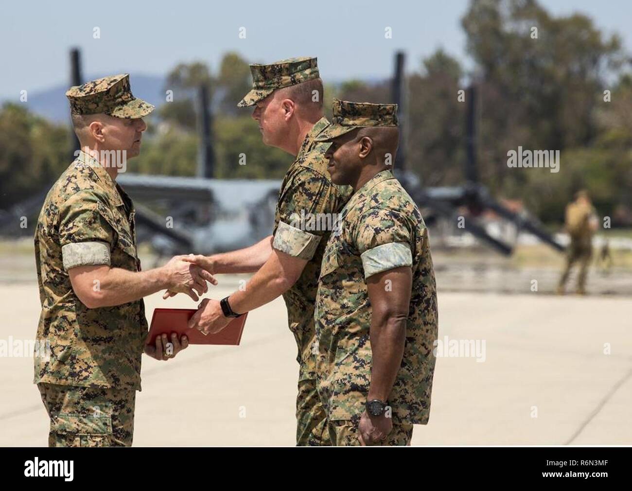 Maj. Gen. Mark Wise, middle, the 3rd Marine Aircraft Wing commanding ...