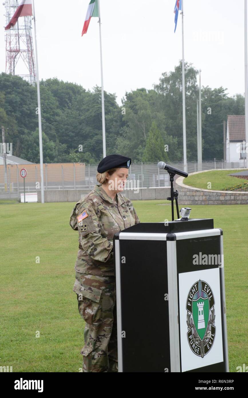 U.S. Army Chaplain Cpt. Christina Regule, gives the invocation during ...