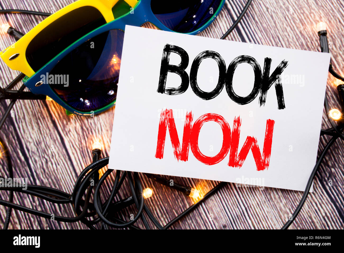 Writing text showing Book Now. Business concept for Reservation Buy ...