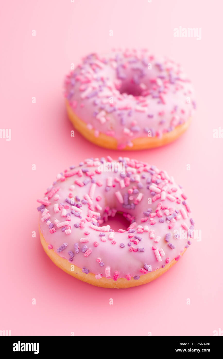 Two pink donuts Stock Photo - Alamy
