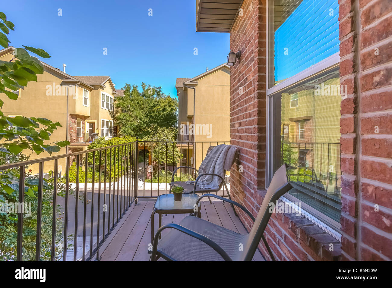 Trees glass balcony reflection hi-res stock photography and images - Alamy