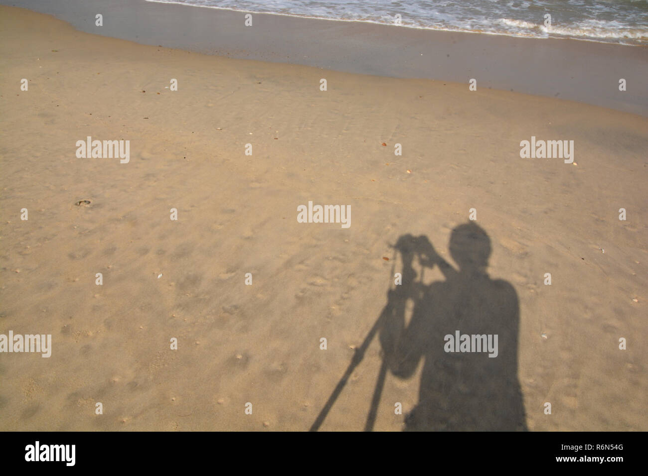 Sand shadow, and photographer Stock Photo - Alamy