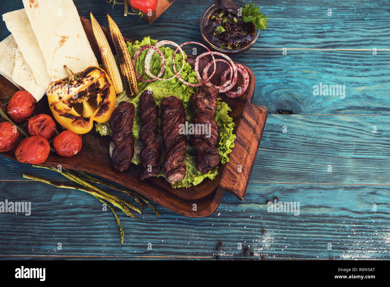 Grilled quail meat Stock Photo - Alamy