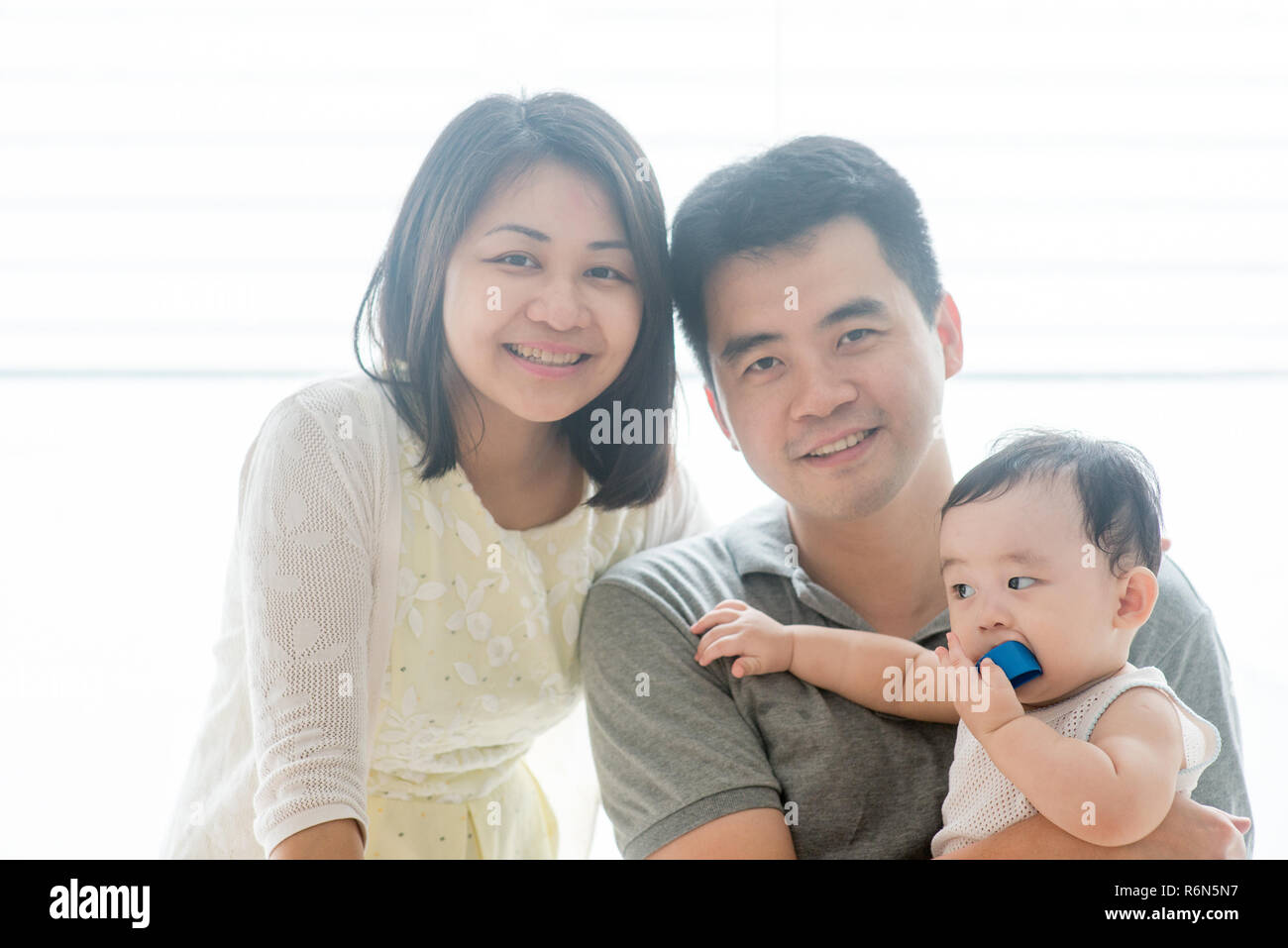 Asian parents and baby boy Stock Photo - Alamy