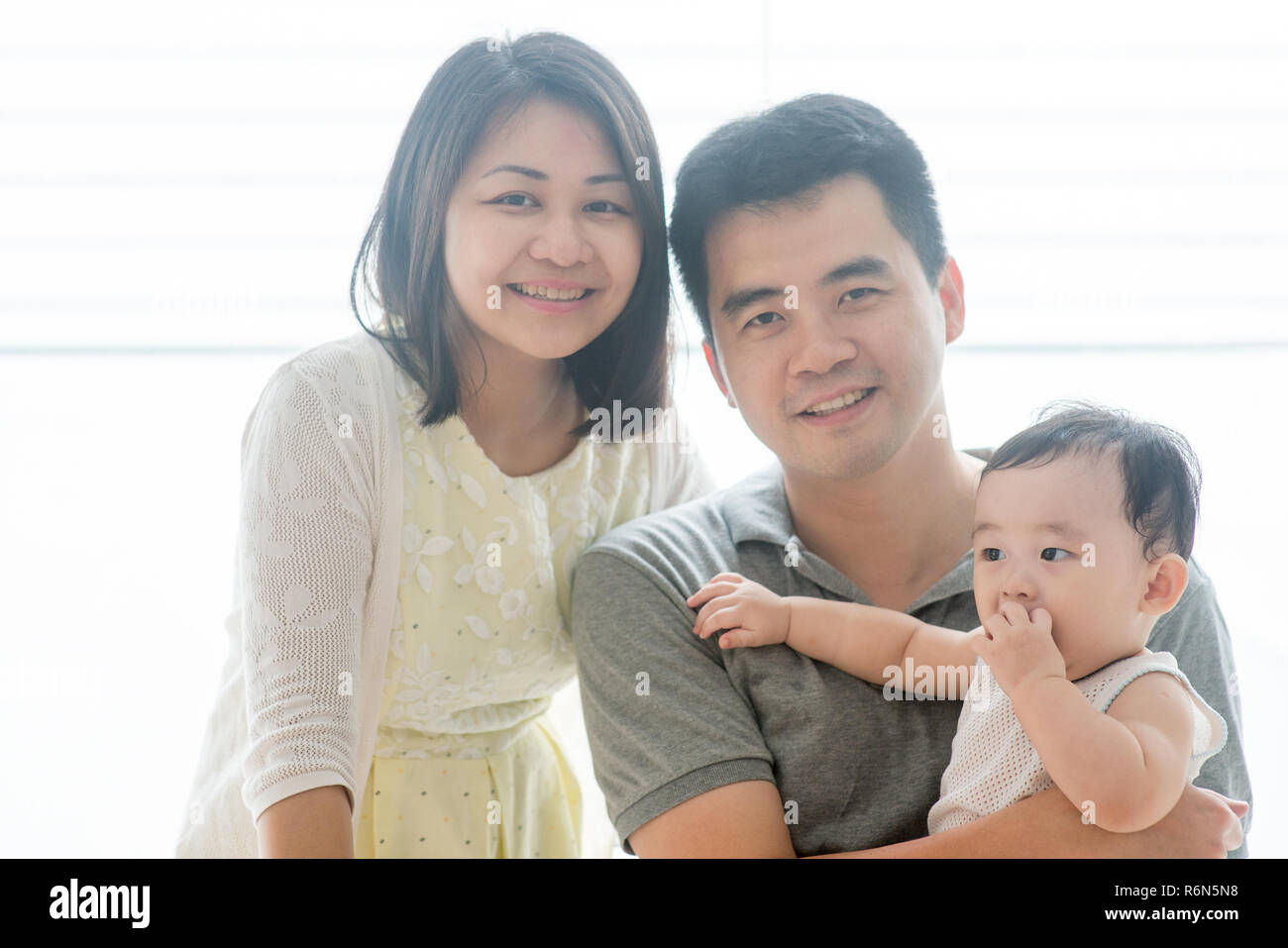 Asian parents and toddler Stock Photo - Alamy