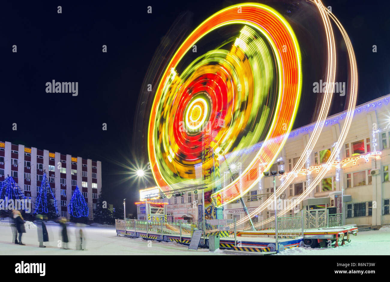 The night the carousel in Christmas town. Russia, Ulyanovsk region ...