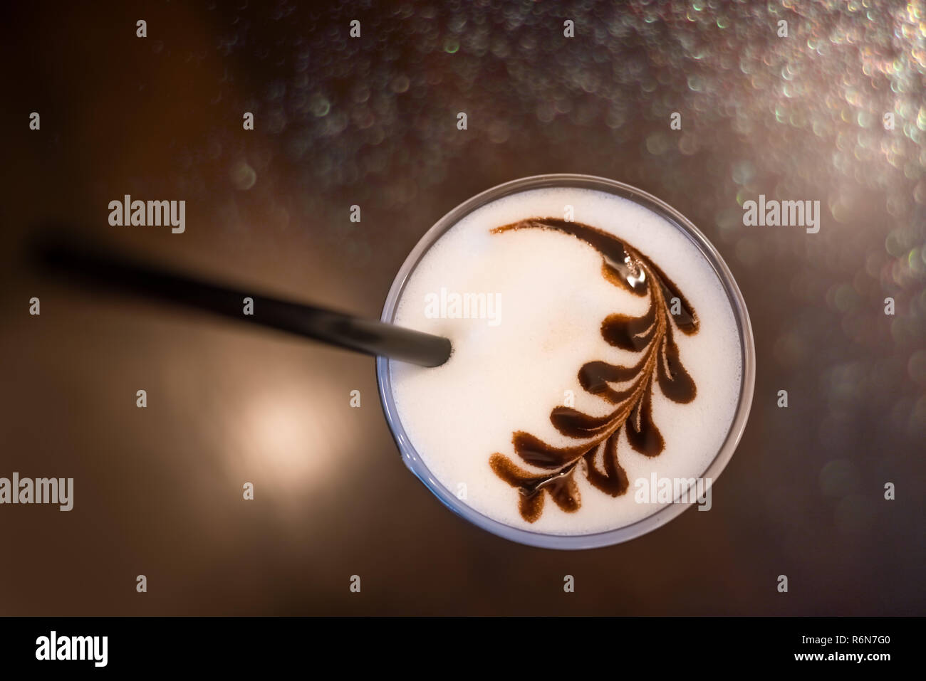 Coffee latte with a leaf pattern Stock Photo - Alamy