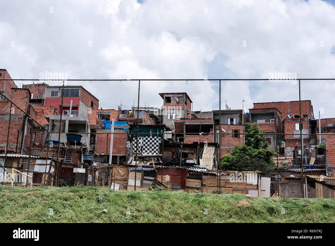 poor community hill shack grid trash slum Carapicuiba Brasil Stock ...