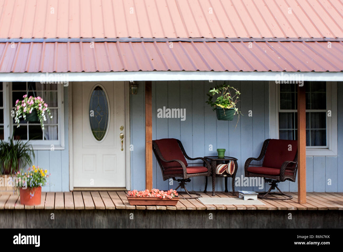 rustic wooden american countryside home couple amrchair Stock Photo - Alamy