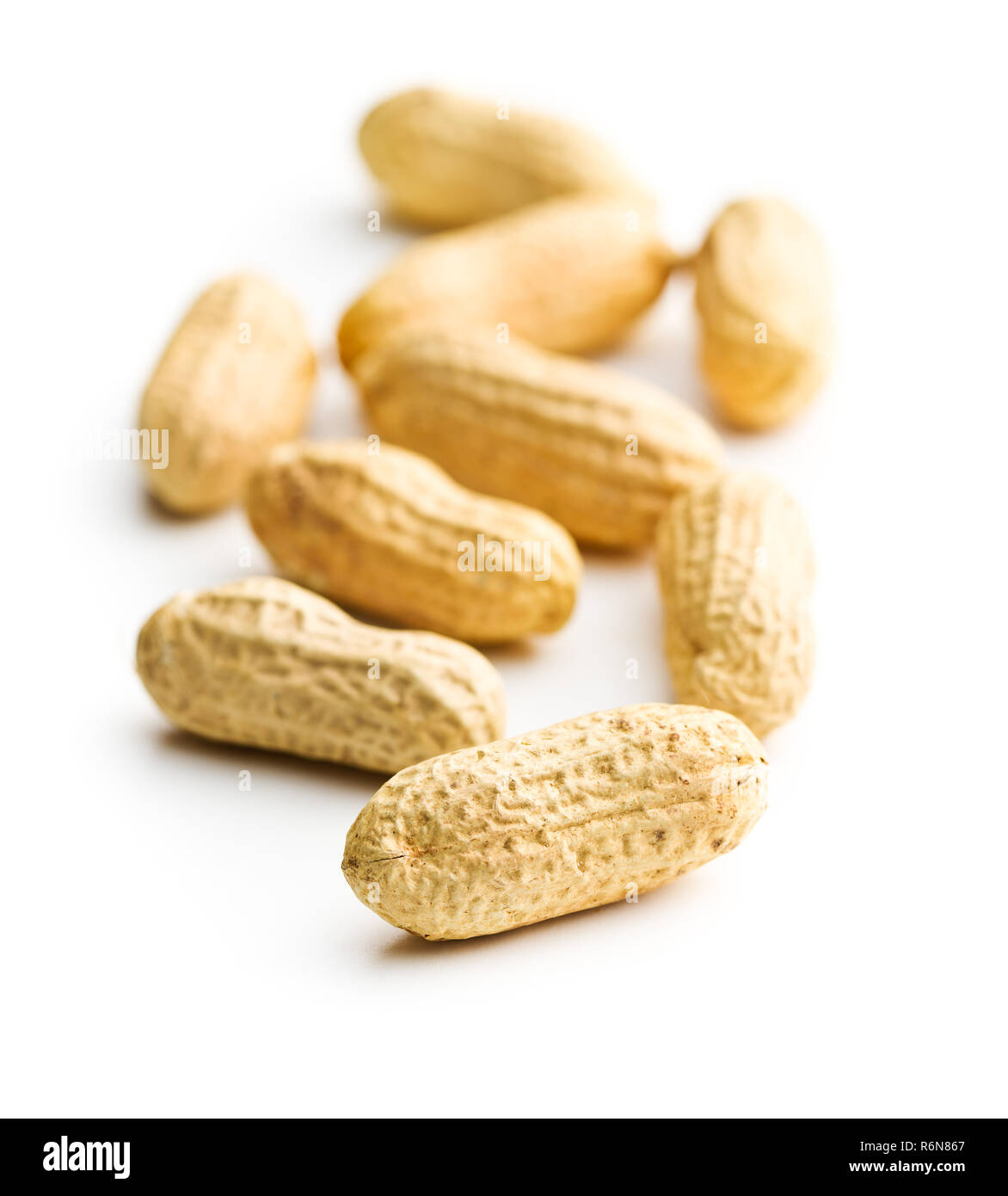 The unpeeled peanuts Stock Photo - Alamy