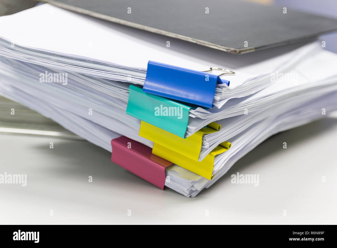 papers documents in archives files with paper clips on desk at offices ...