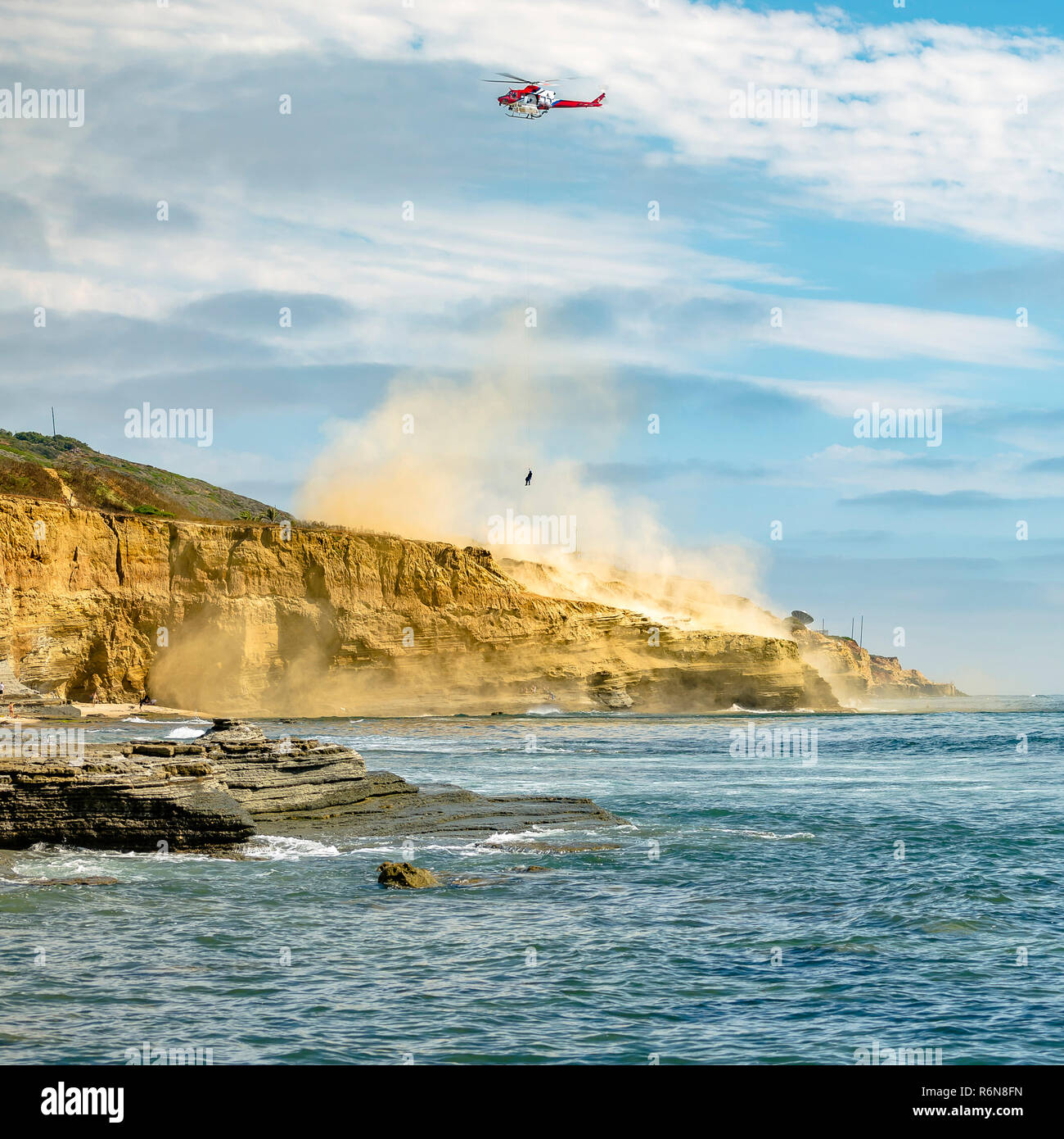 Chopper in flight over cliff and ocean in La Jolla Stock Photo - Alamy