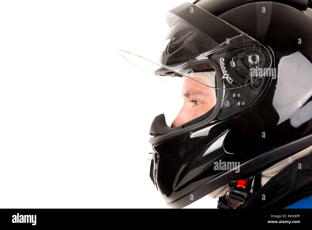 Racing driver with helmet Stock Photo - Alamy