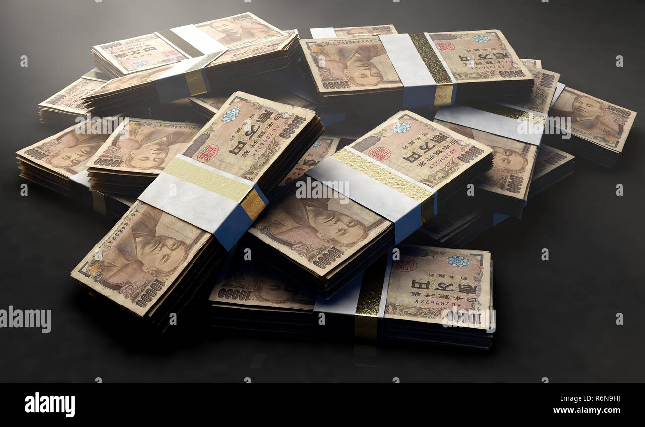 A pile of randomly scattered bundles of japanese yen banknotes on an ...