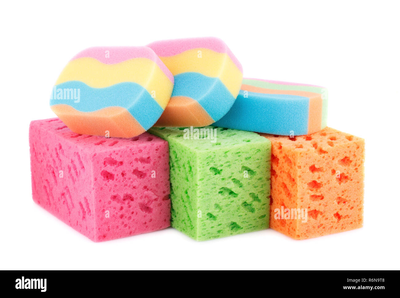 Colorful sponges isolated on white background Stock Photo - Alamy