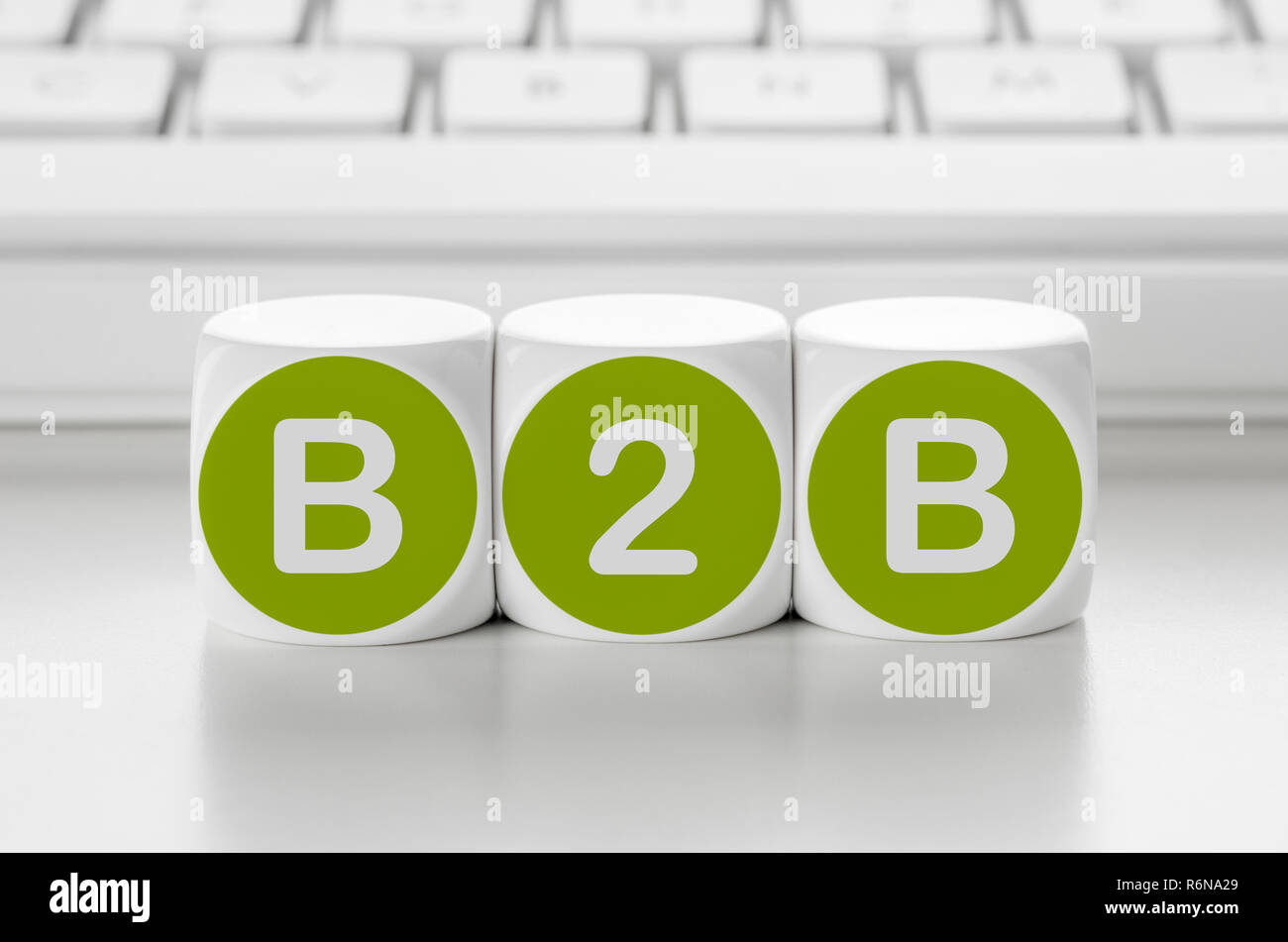 letter cubes in front of a keyboard - b2b Stock Photo - Alamy