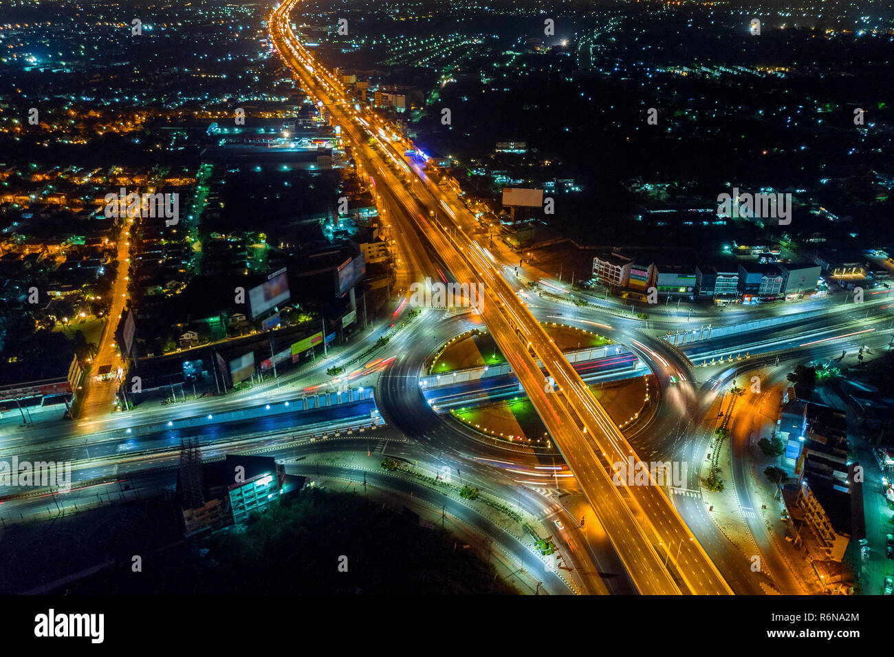 Aerial view of traffic in roundabout and highway at night Stock Photo ...