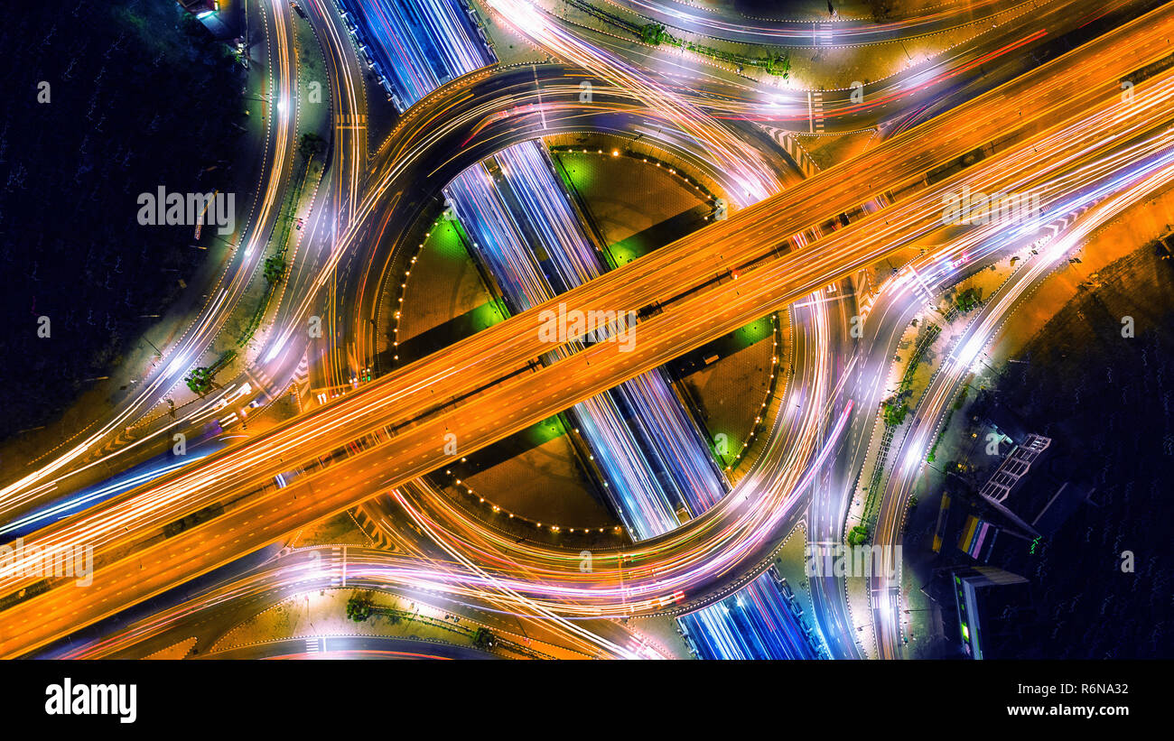 Aerial view of traffic in roundabout and highway at night Stock Photo ...