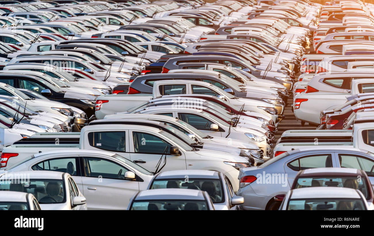 Row of new cars in port Stock Photo - Alamy