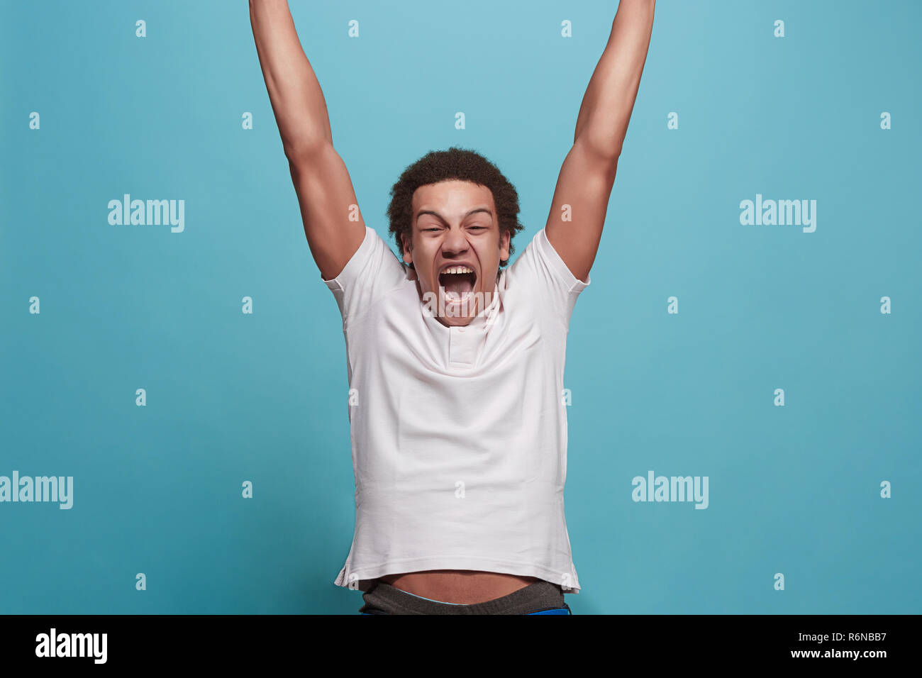 Winning success man happy ecstatic celebrating being a winner. Dynamic ...