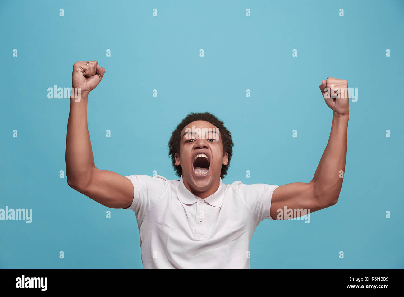Winning success man happy ecstatic celebrating being a winner. Dynamic ...