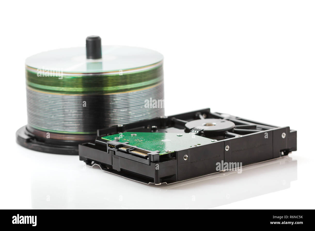 Hard disk drive and compact discs Stock Photo - Alamy