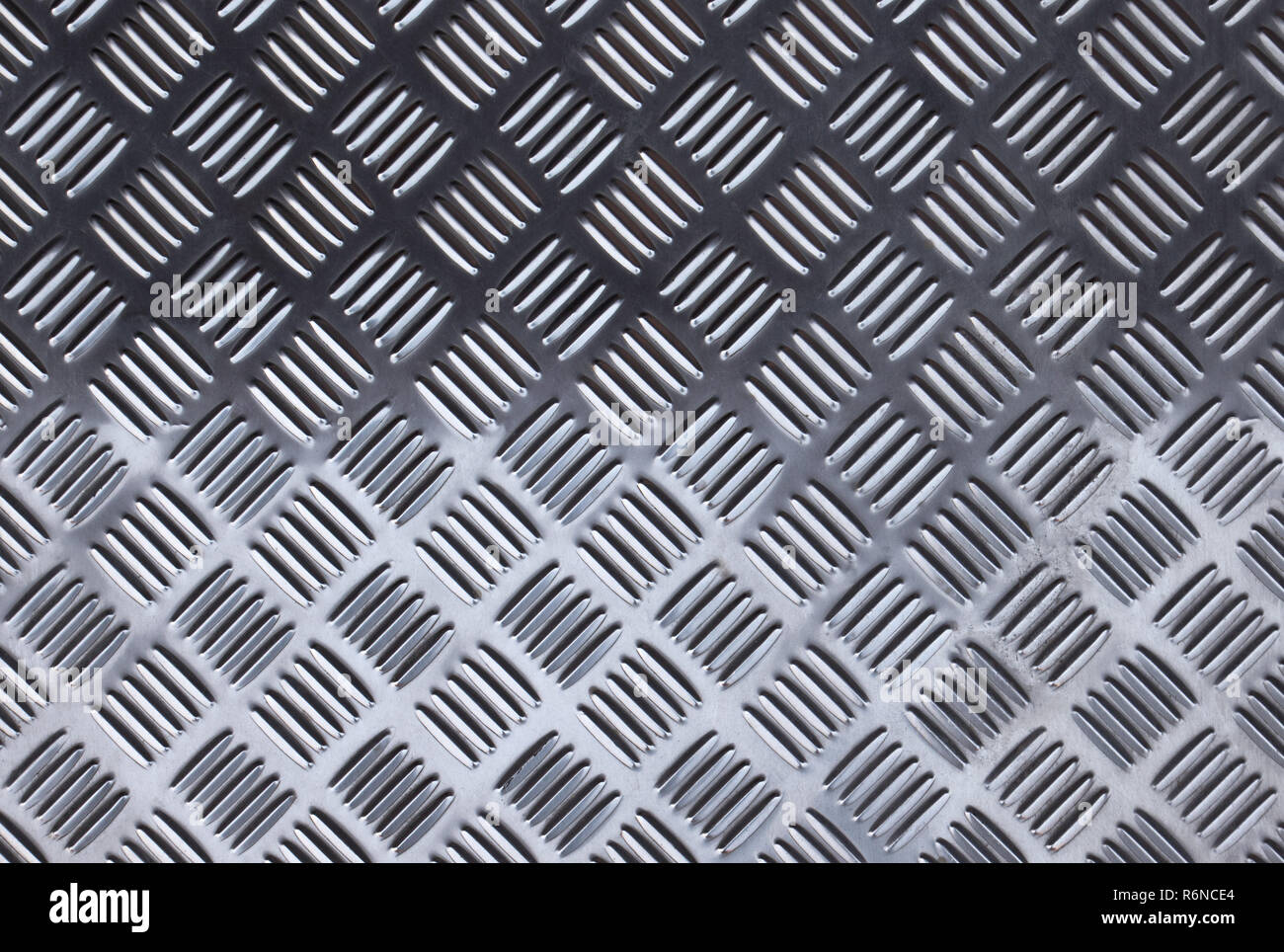 Metal plate pattern background Stock Photo - Alamy