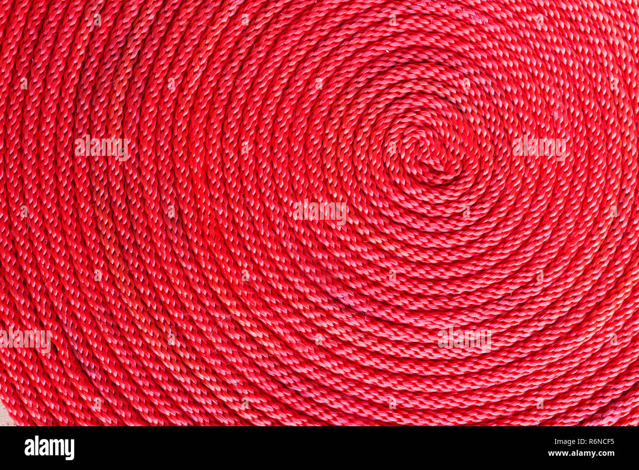 Red rope coil Stock Photo - Alamy