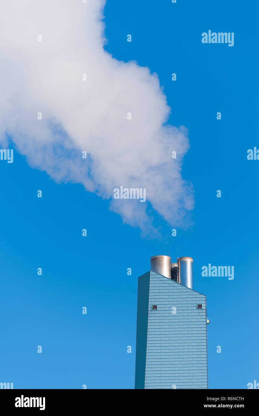 smoking factory chimney Stock Photo - Alamy