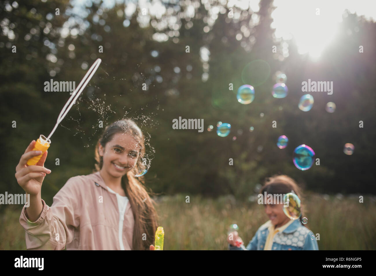 Playing with Bubbles Stock Photo - Alamy