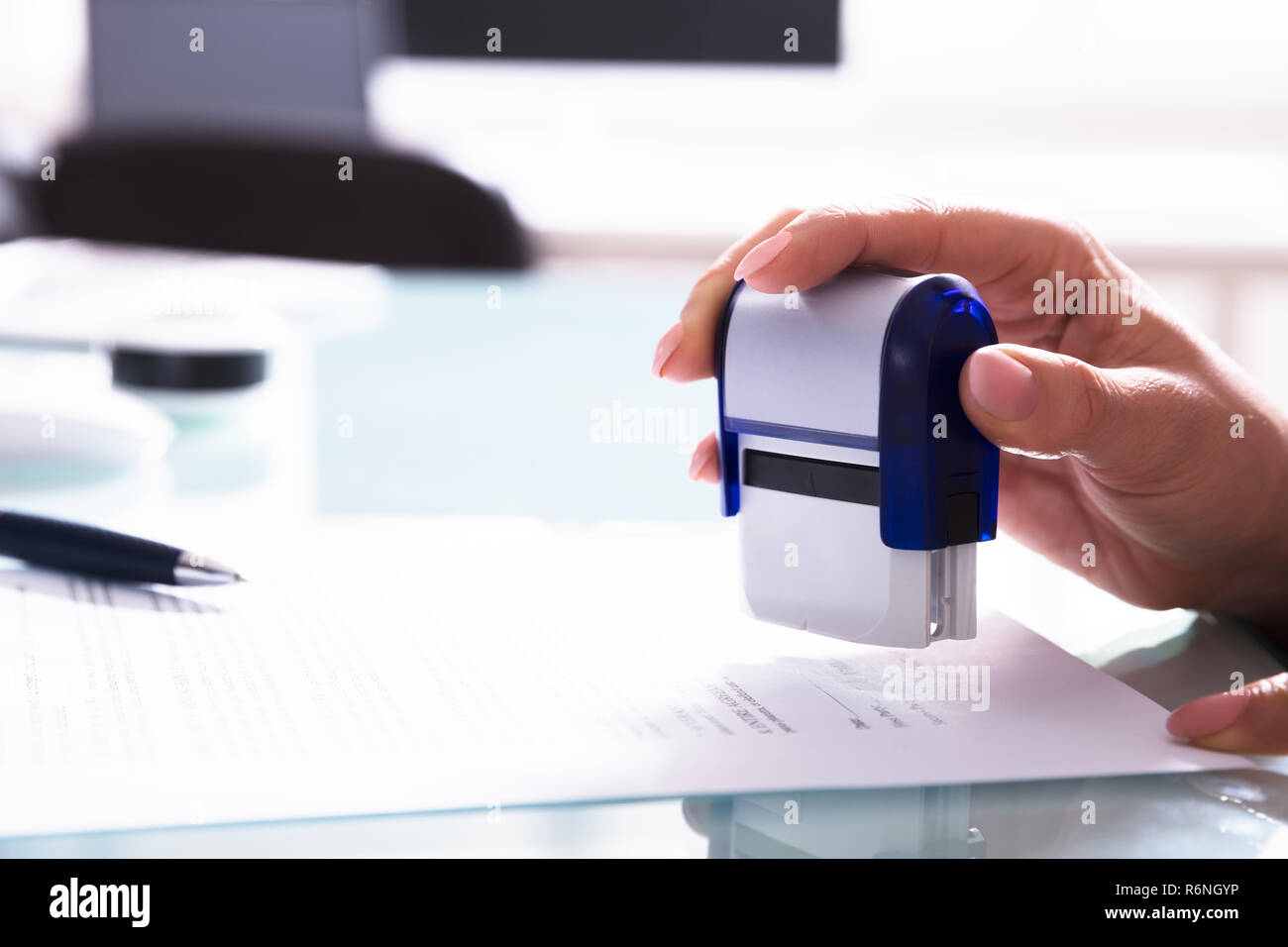 Notary pen stamping document hi-res stock photography and images - Alamy