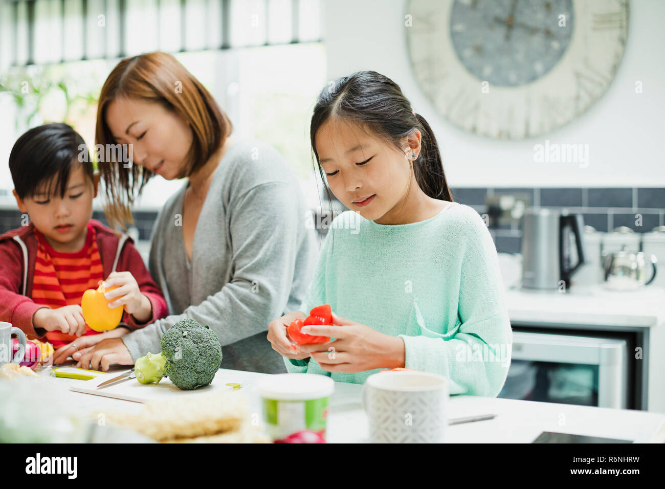 Helping Mum to Prepare the Dinner Stock Photo - Alamy