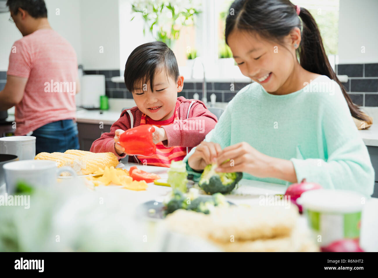 Children Helping to Prepare Dinner Stock Photo - Alamy