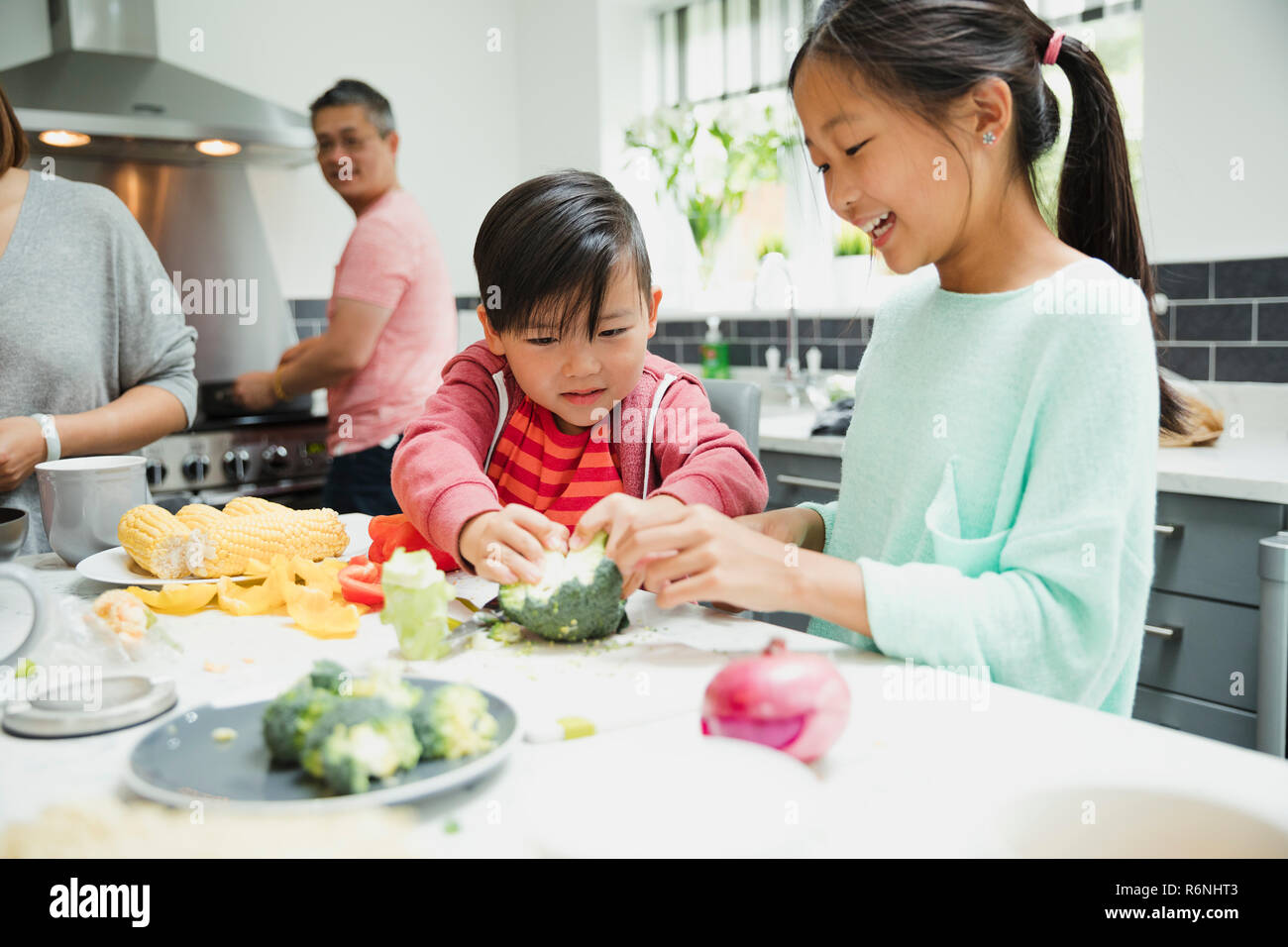 Children Helping to Prepare Dinner Stock Photo - Alamy