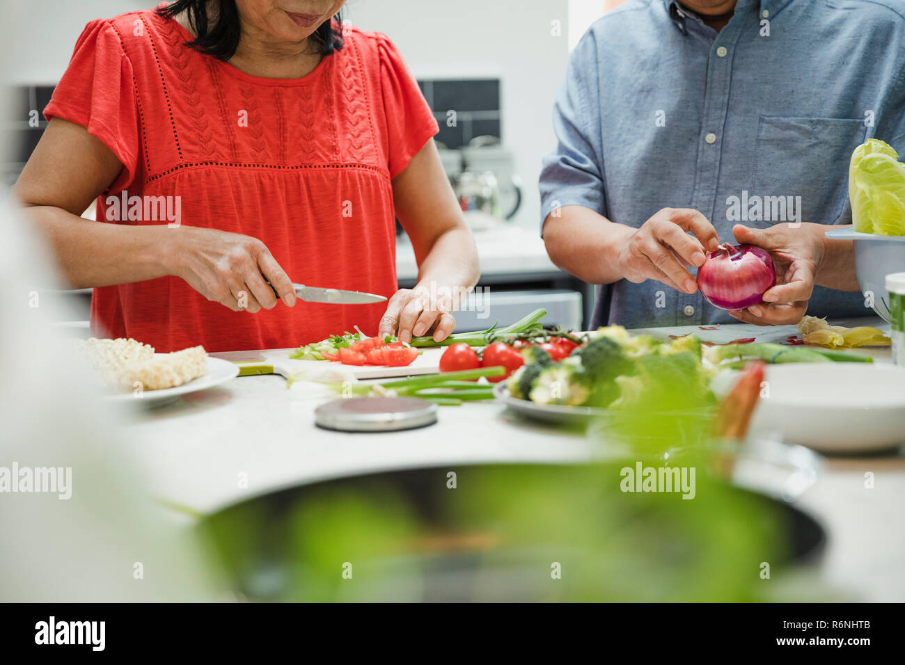 Senior Couple Making a Stir Fry Together Stock Photo - Alamy