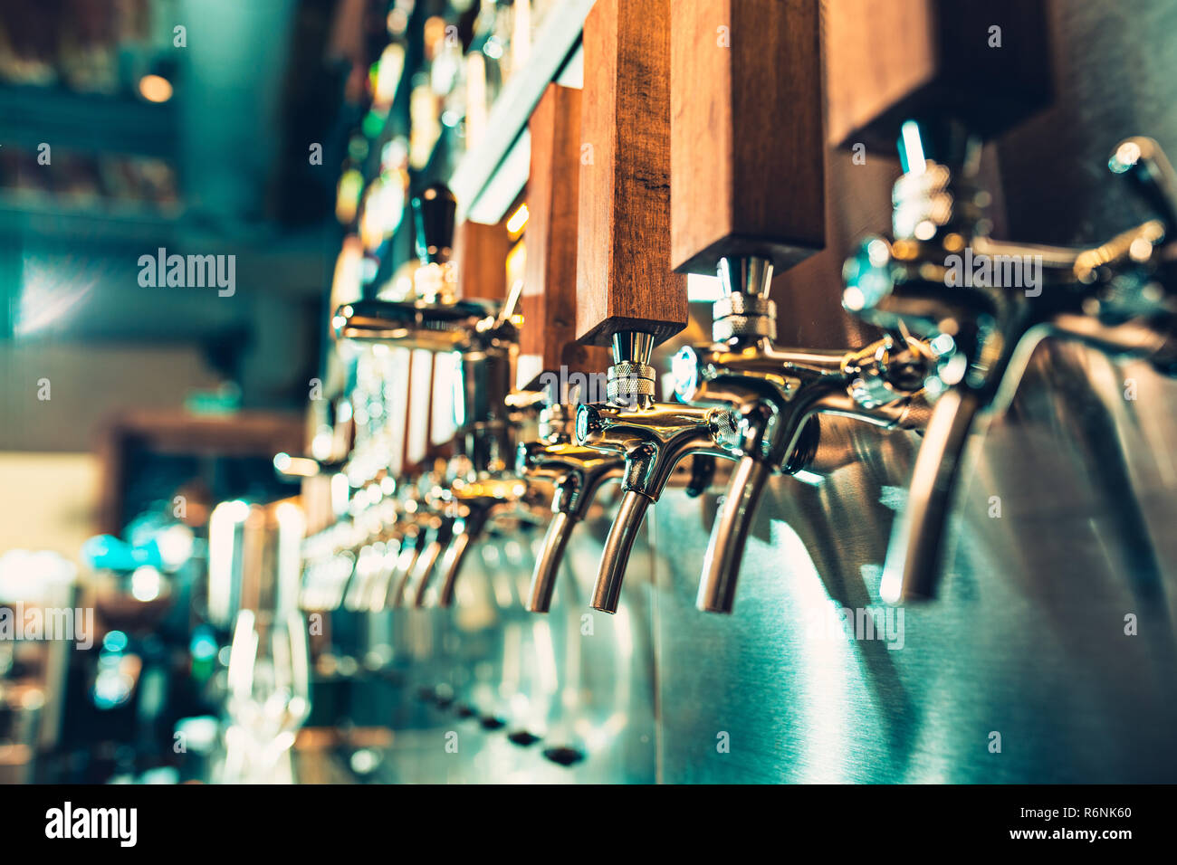 Beer craft. Bar table. Steel taps. Shiny taps. Glassses with beer Stock ...