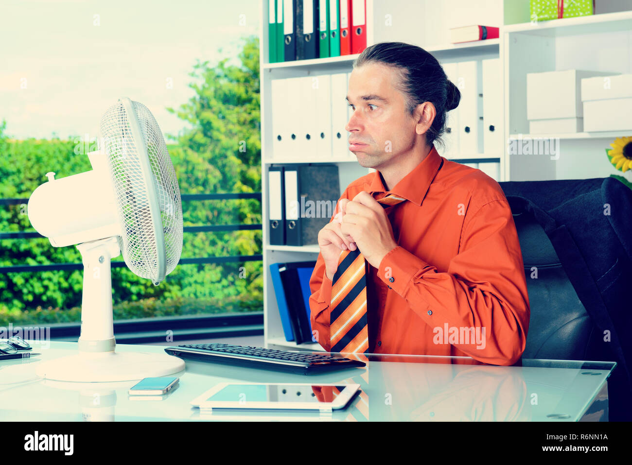Man sweating in business suit hi-res stock photography and images - Alamy