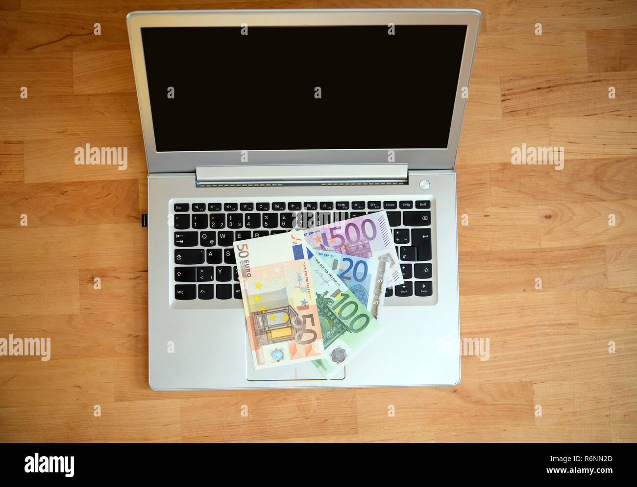 computer keyboard with euro bank notes Stock Photo - Alamy
