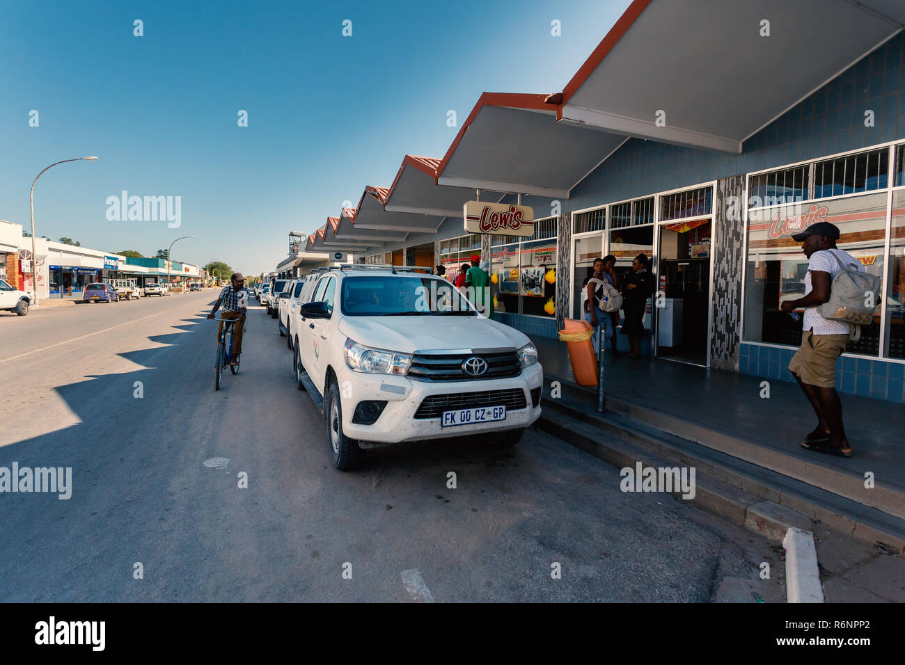 NAMIBIA, TSUMEB, MAY 12: Ordinary people on typical african street with ...