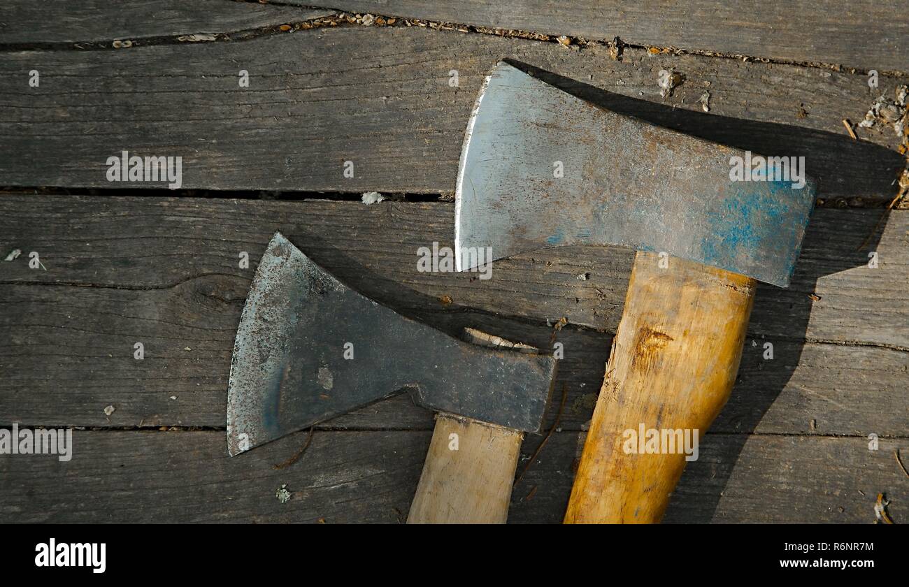 Two Axes on the ground Stock Photo - Alamy