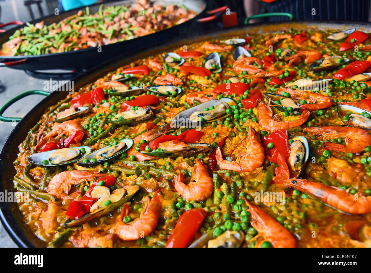Spanish paella prepared in the street restaurant Stock Photo - Alamy