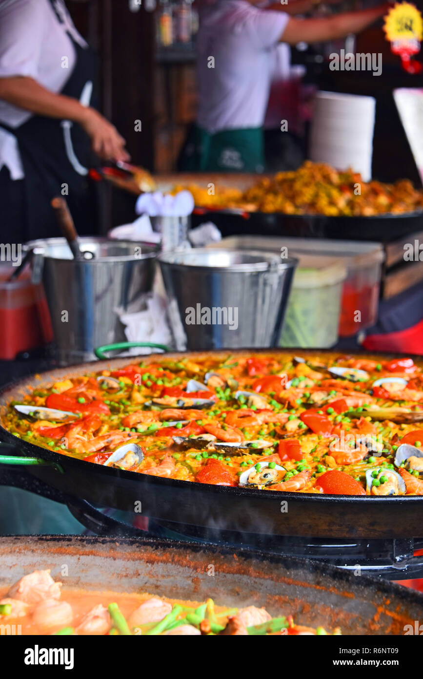 Spanish paella prepared in the street restaurant Stock Photo - Alamy