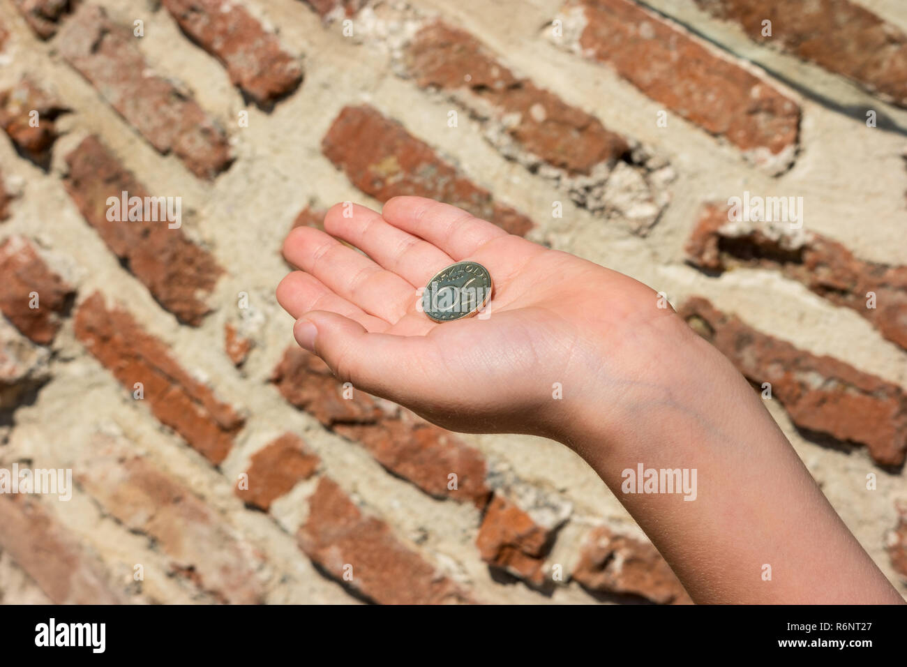 Palm coin hi-res stock photography and images - Alamy