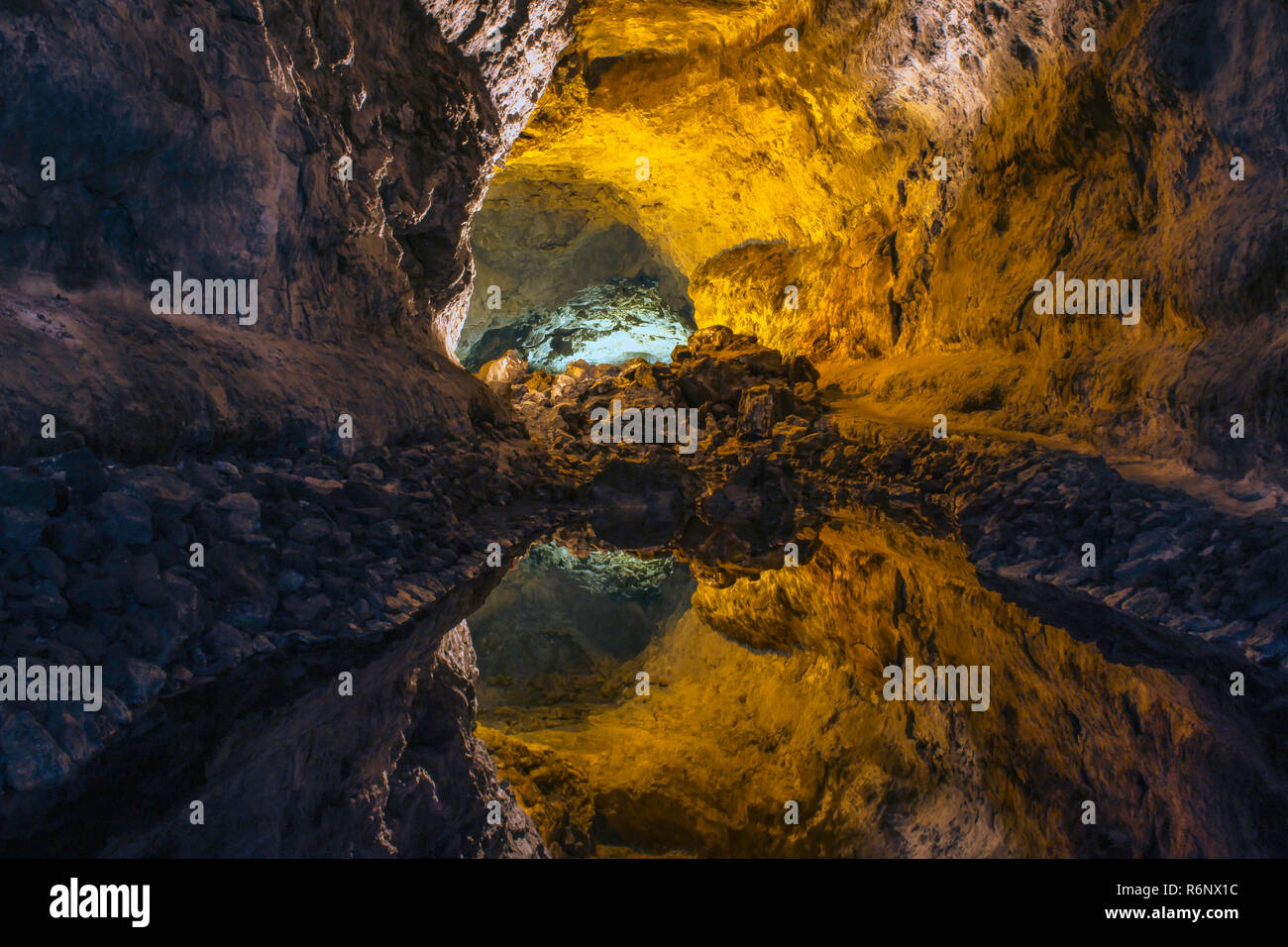 Underground lake inside volcanic cave Cueva de los Verdes Stock Photo ...