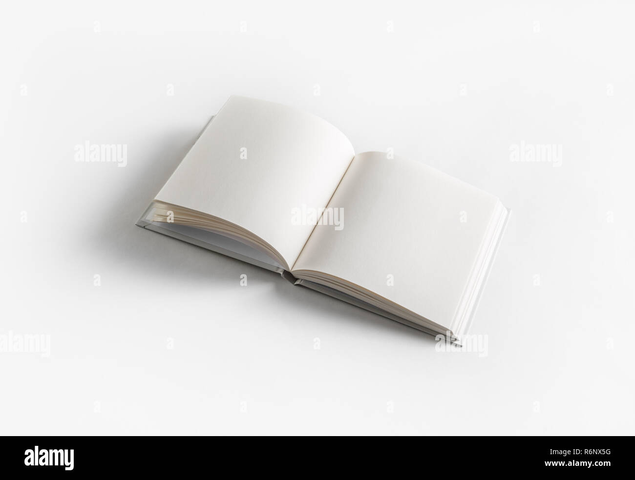 White opened book Stock Photo - Alamy