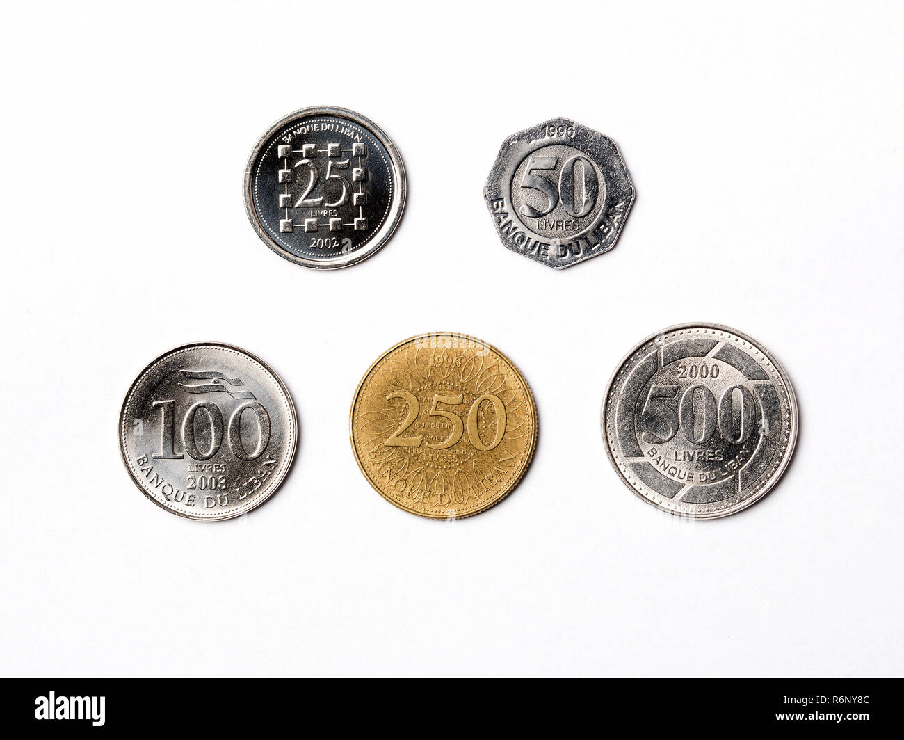 Lebanese coins on a white background Stock Photo - Alamy