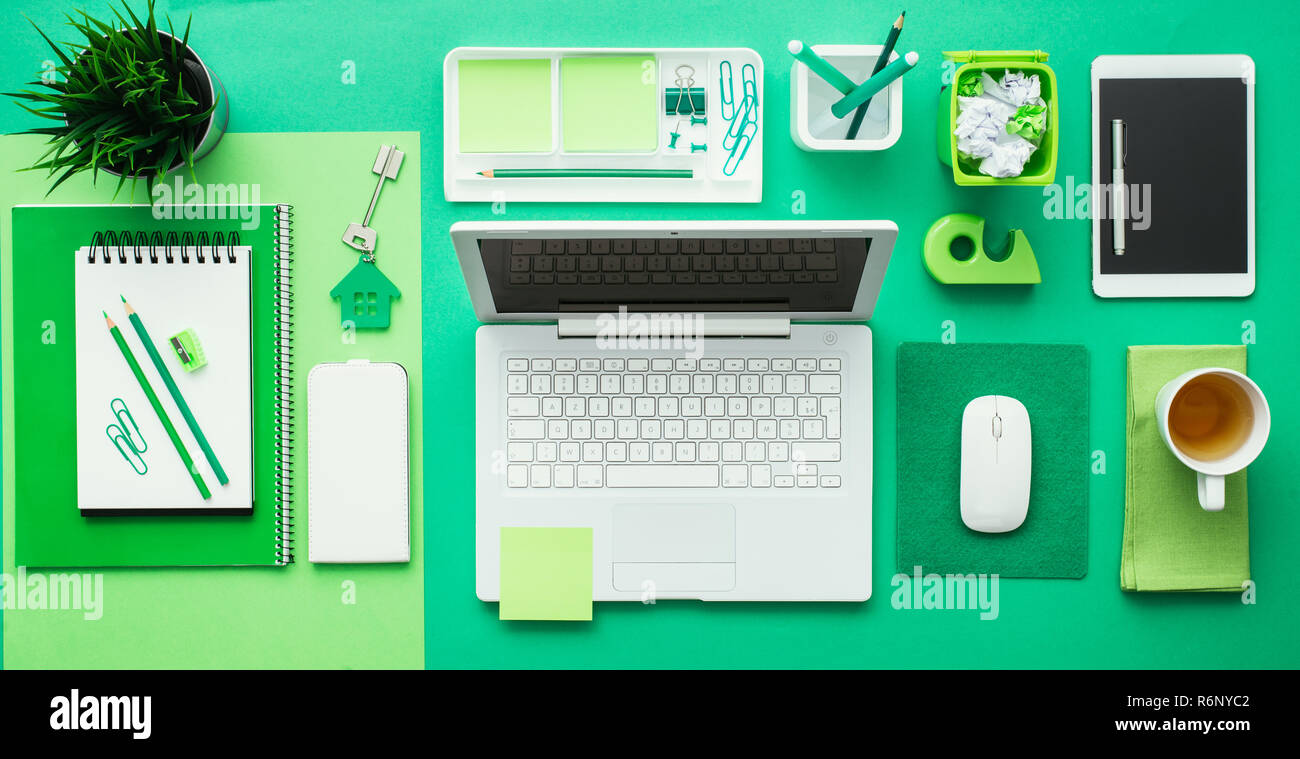 Green creative desktop Stock Photo - Alamy